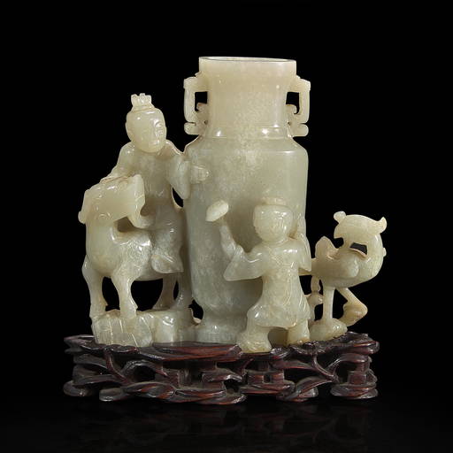 A Chinese jade "Boys, Kylin and Phoenix" vase on carved wood stand 玉雕童子 ...