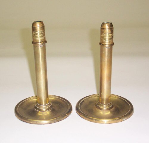 6: PAIR OF SPRING-LOADED BRASS CANDLESTICKS