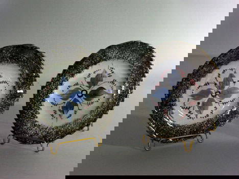 Two Staffordshire Brown Spatterware Cup Plates,