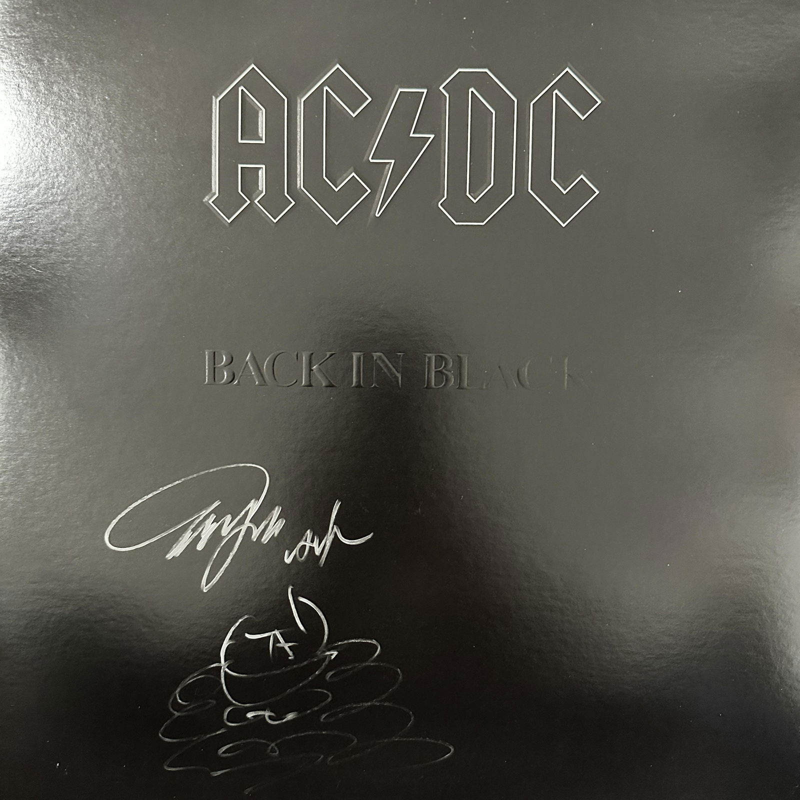 Angus Young Autographed Album W/sketch