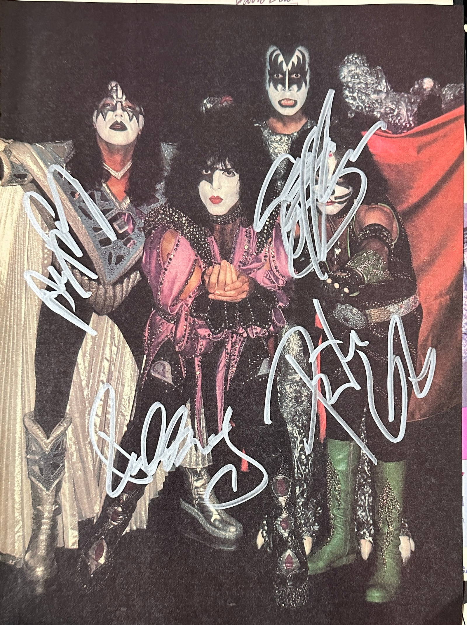 Kiss Autographed Magazine Page Auction