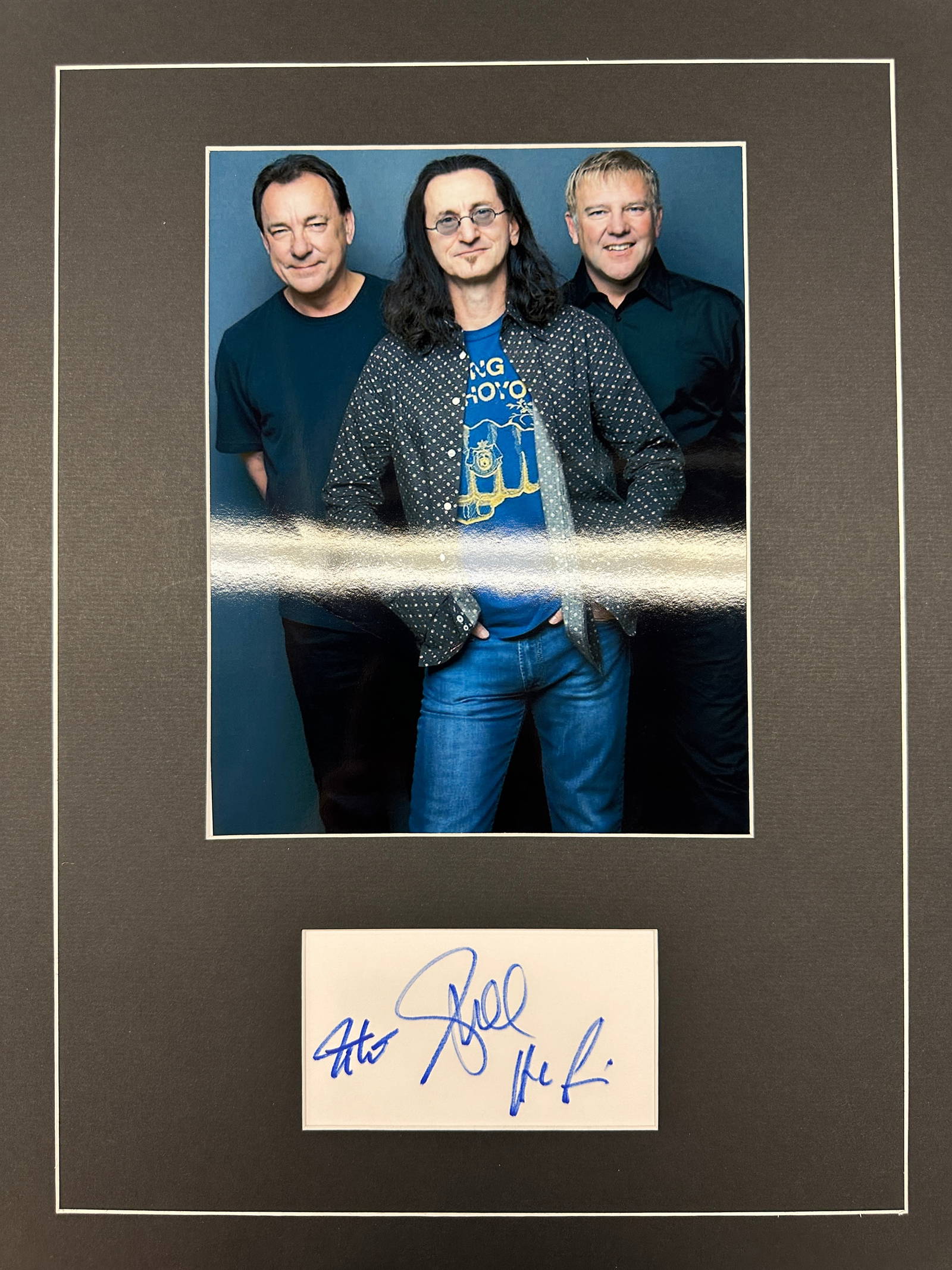 Rush Autograph Display Auction