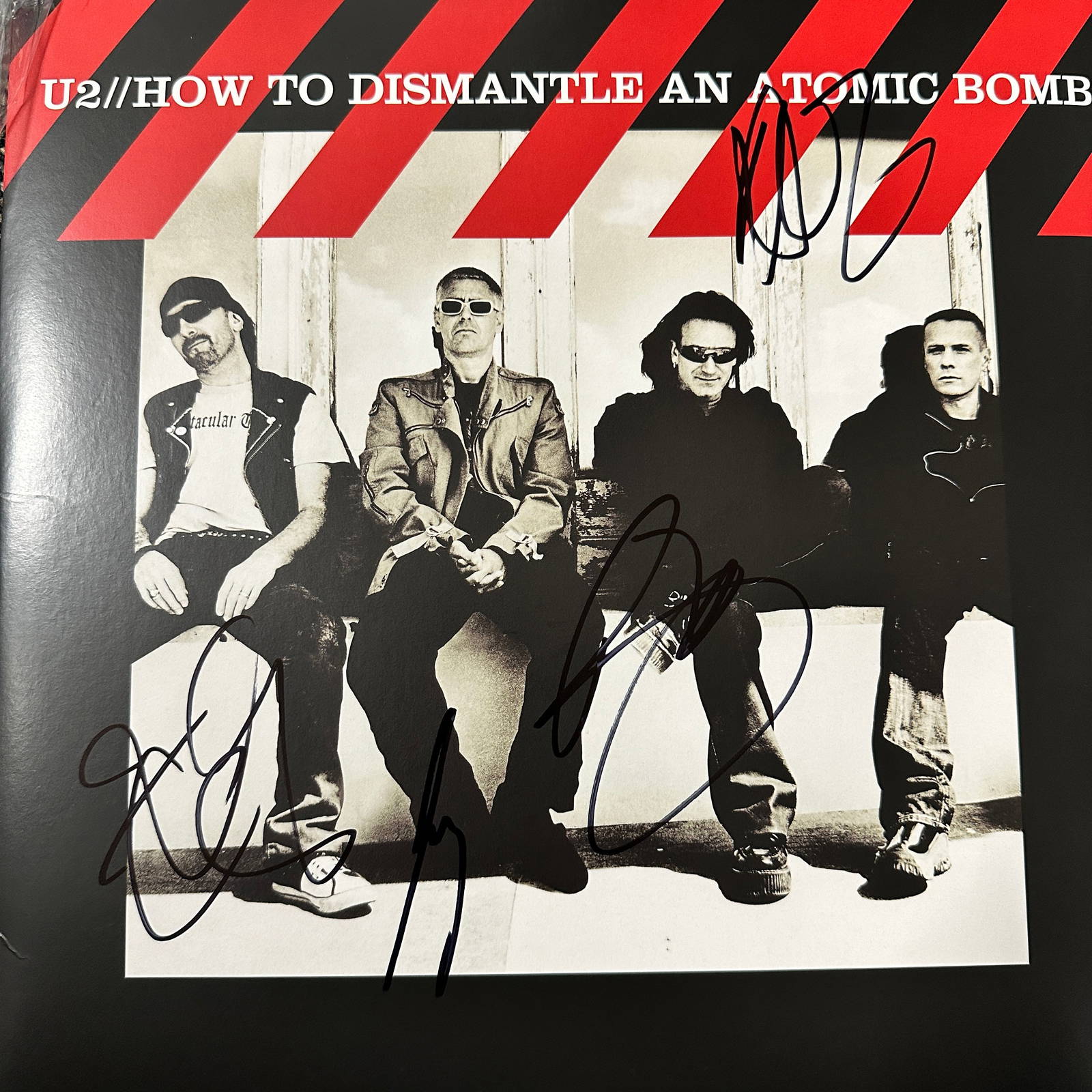 U2 Autographed Album All 4 Auction