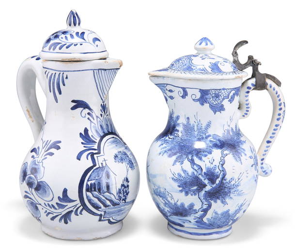 TWO DELFT CRUET JUGS, 19TH CENTURY, each blue painted, one with hinged ...