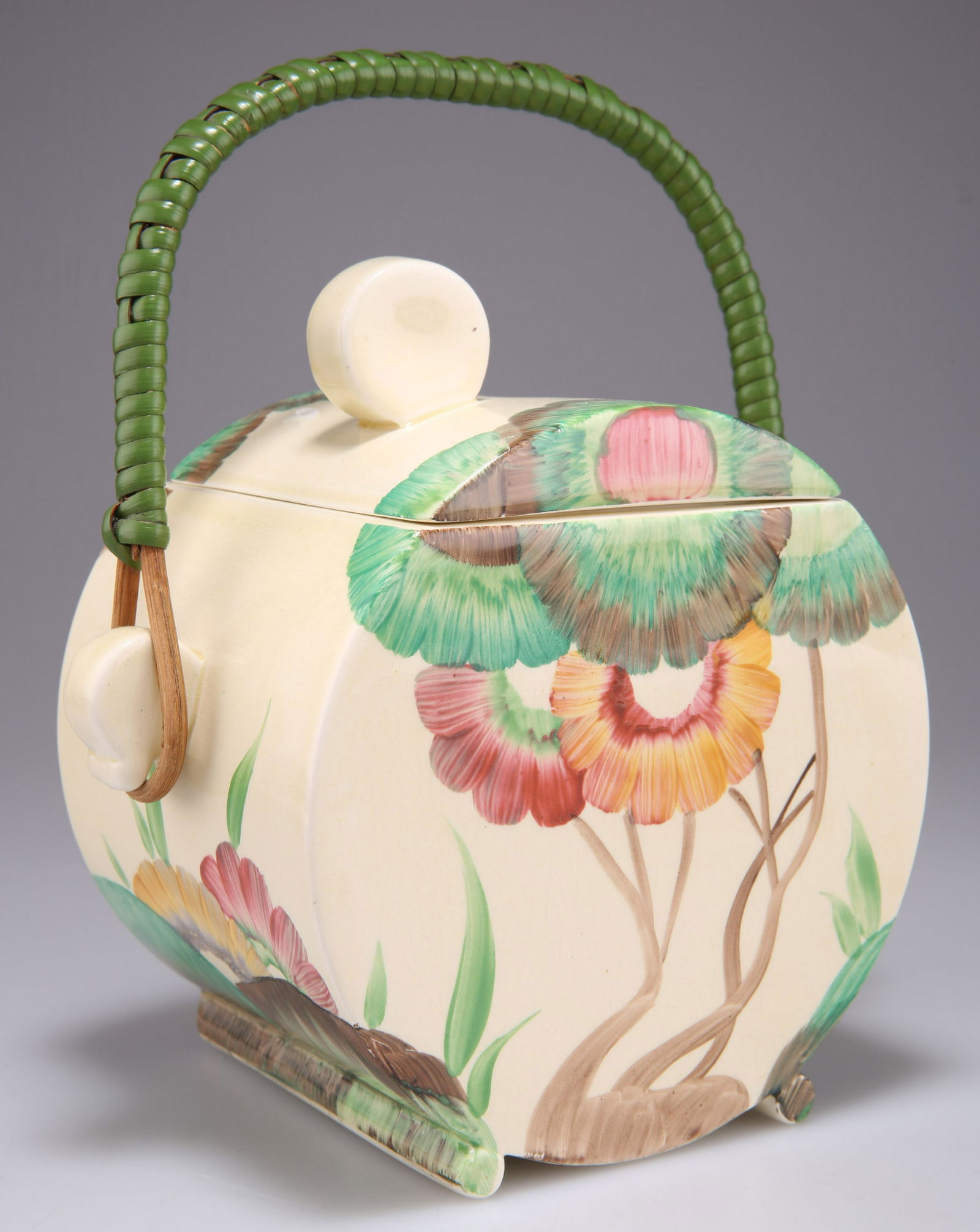 A CLARICE CLIFF BIZARRE 'AUREA' PATTERN BONJOUR BISCUIT BARREL, with a ...