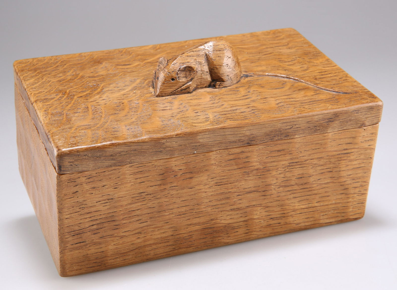 ROBERT THOMPSON OF KILBURN, A MOUSEMAN ADZED OAK TRINKET BOX, of ...