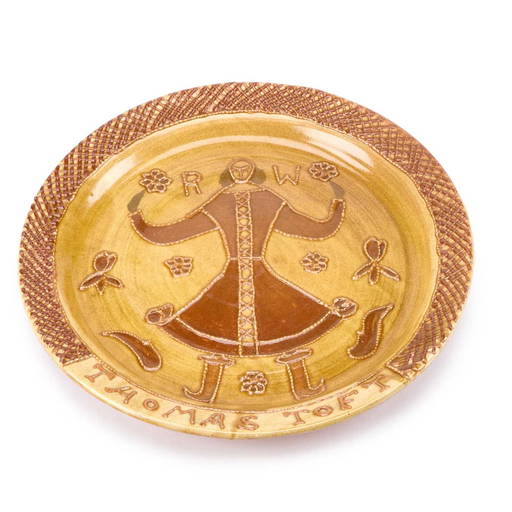 A Large Slipware Charger In The Manner Of Thomas Toft