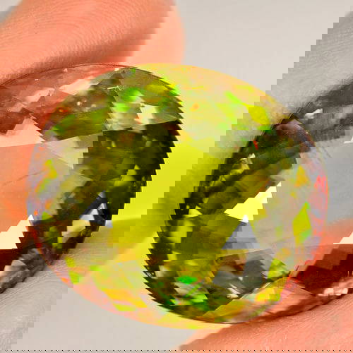 Natural Multi Color Sphene 62.90 Ct. Oval Shape 27 X 23 Mm. Gemstone ...