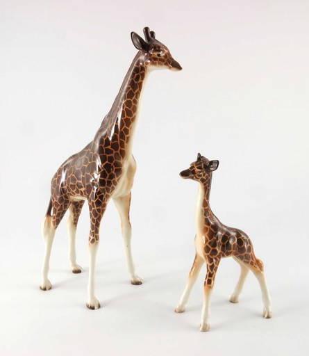 A Beswick Figure Of A Giraffe And Calf, Modelled