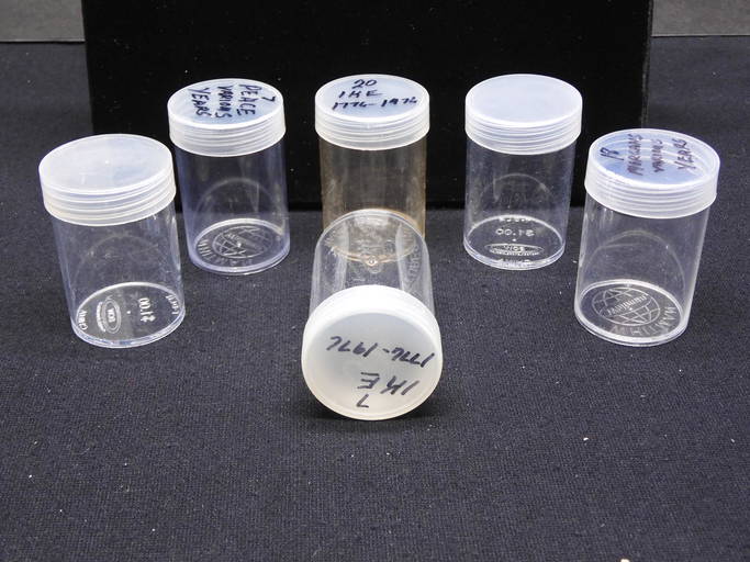 Six Empty Coin Tubes