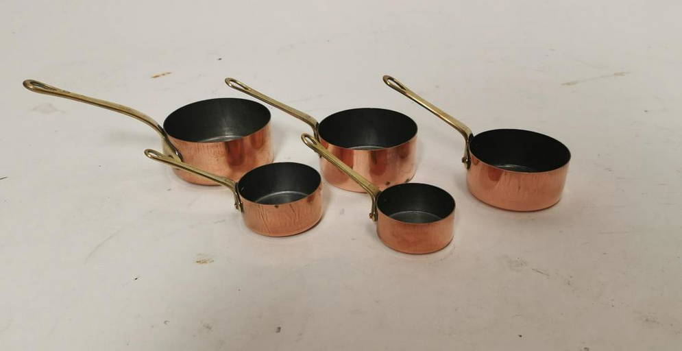Set Of Five Copper And Brass Sauce Saucepans.