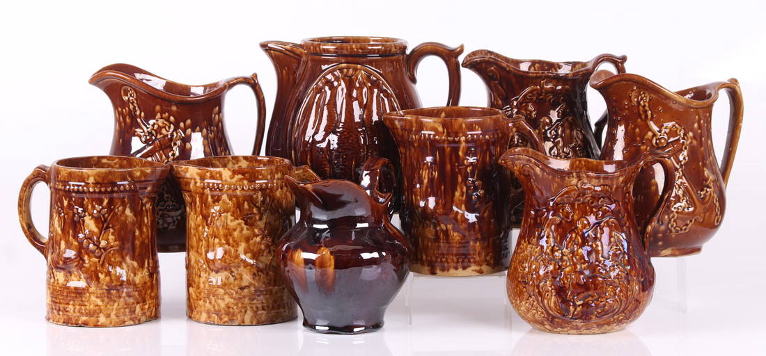 Rockingham Glazed Pottery Pitchers, Including Pairs