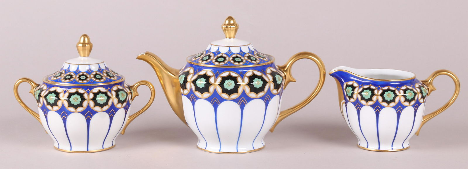 A Three Piece Porcelain Tea Set