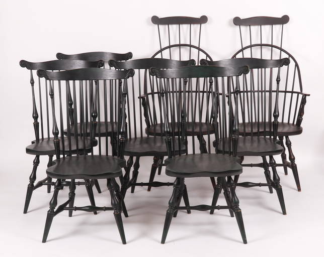 A Set Of Eight Black Painted Windsor Dining Chairs