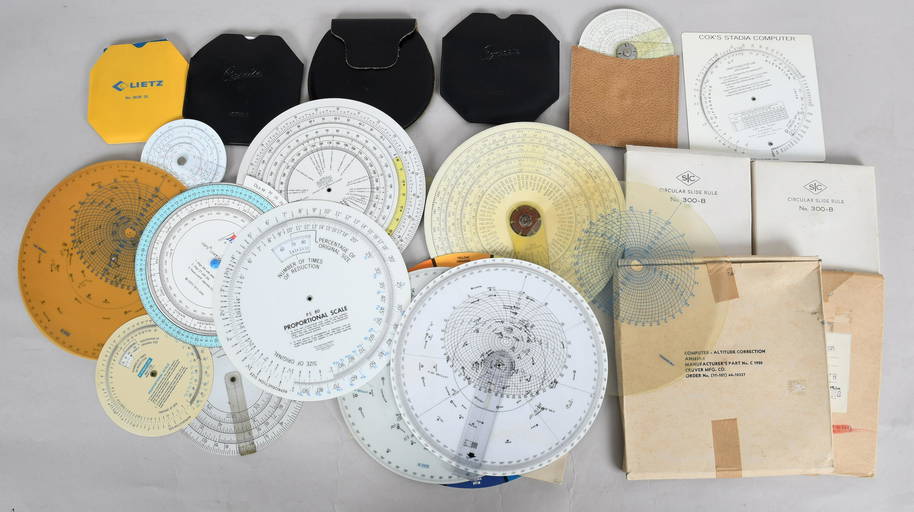 Eighteen Circular Slide Rules And Calculators