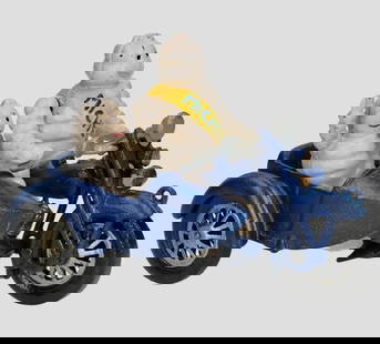 Cast Iron Michelin Man On Motorcycle