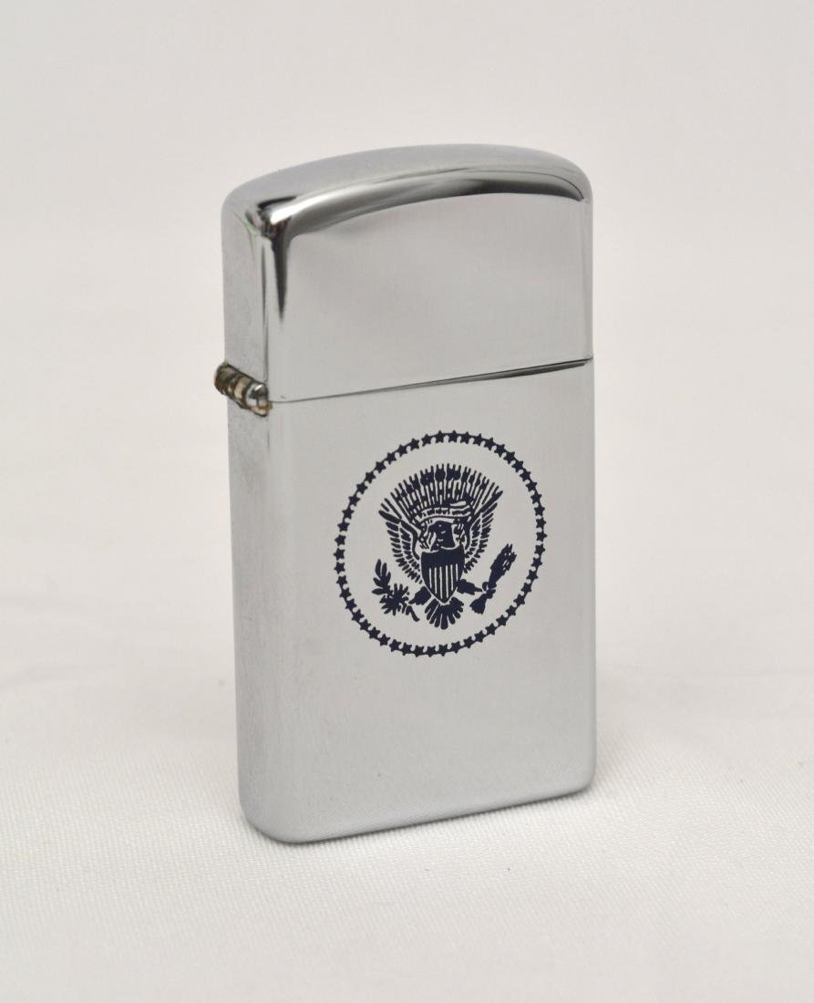 Two JFK Zippo Lighters
