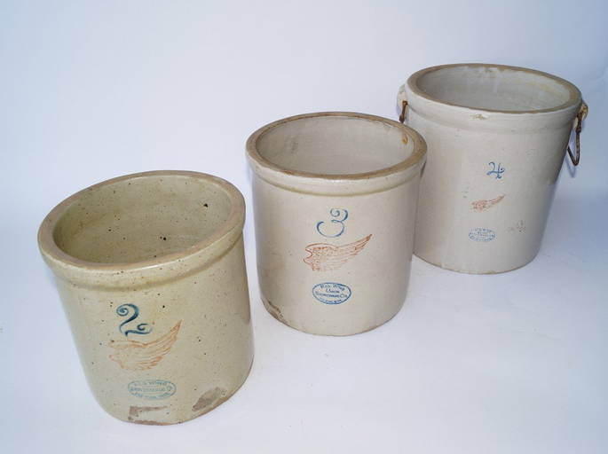 Eight Stoneware Crocks