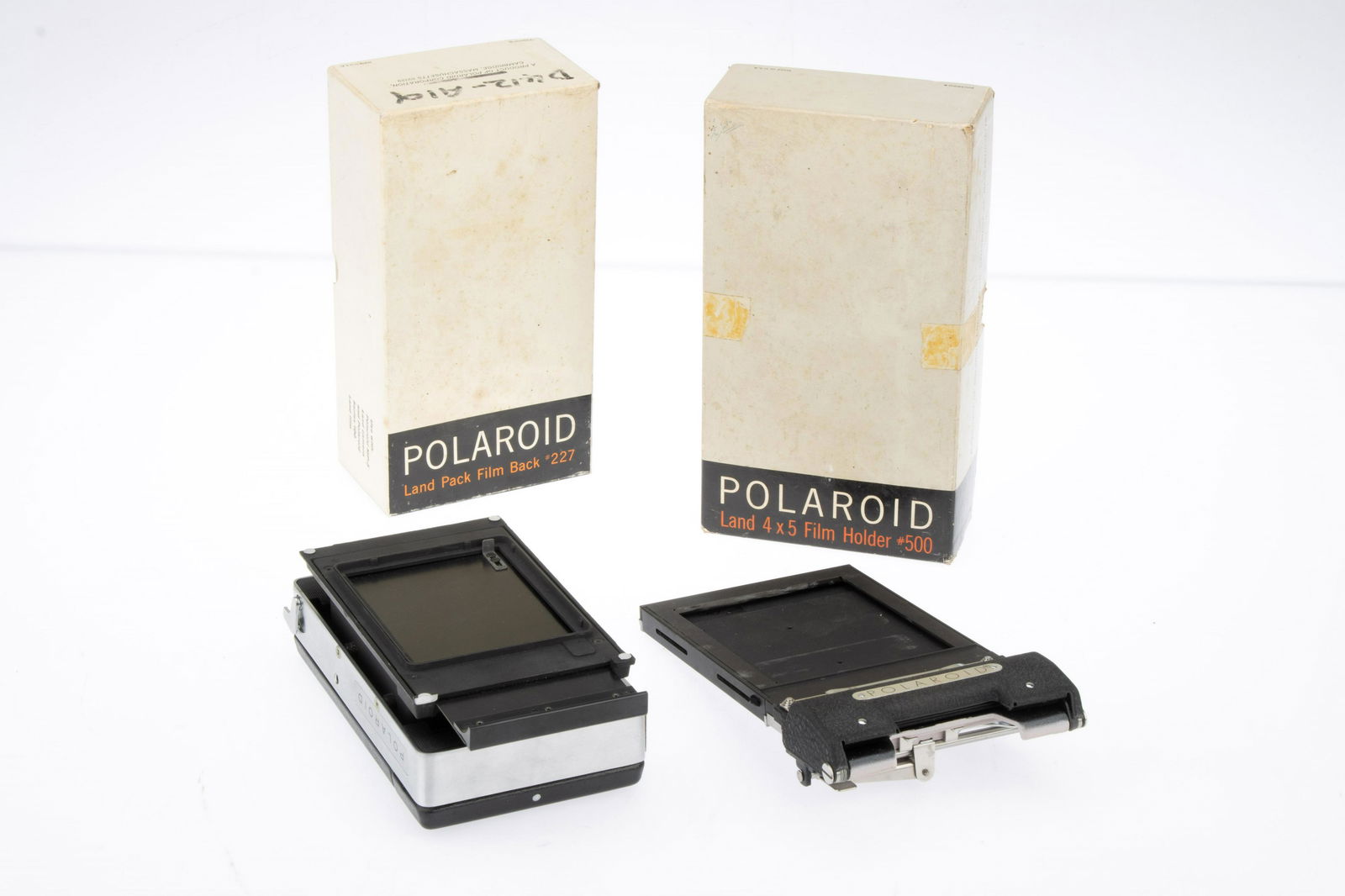 Two Polaroid Film Backs,