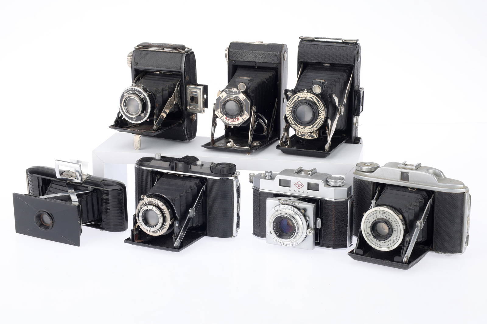 A Group Of Folding Cameras, Auction