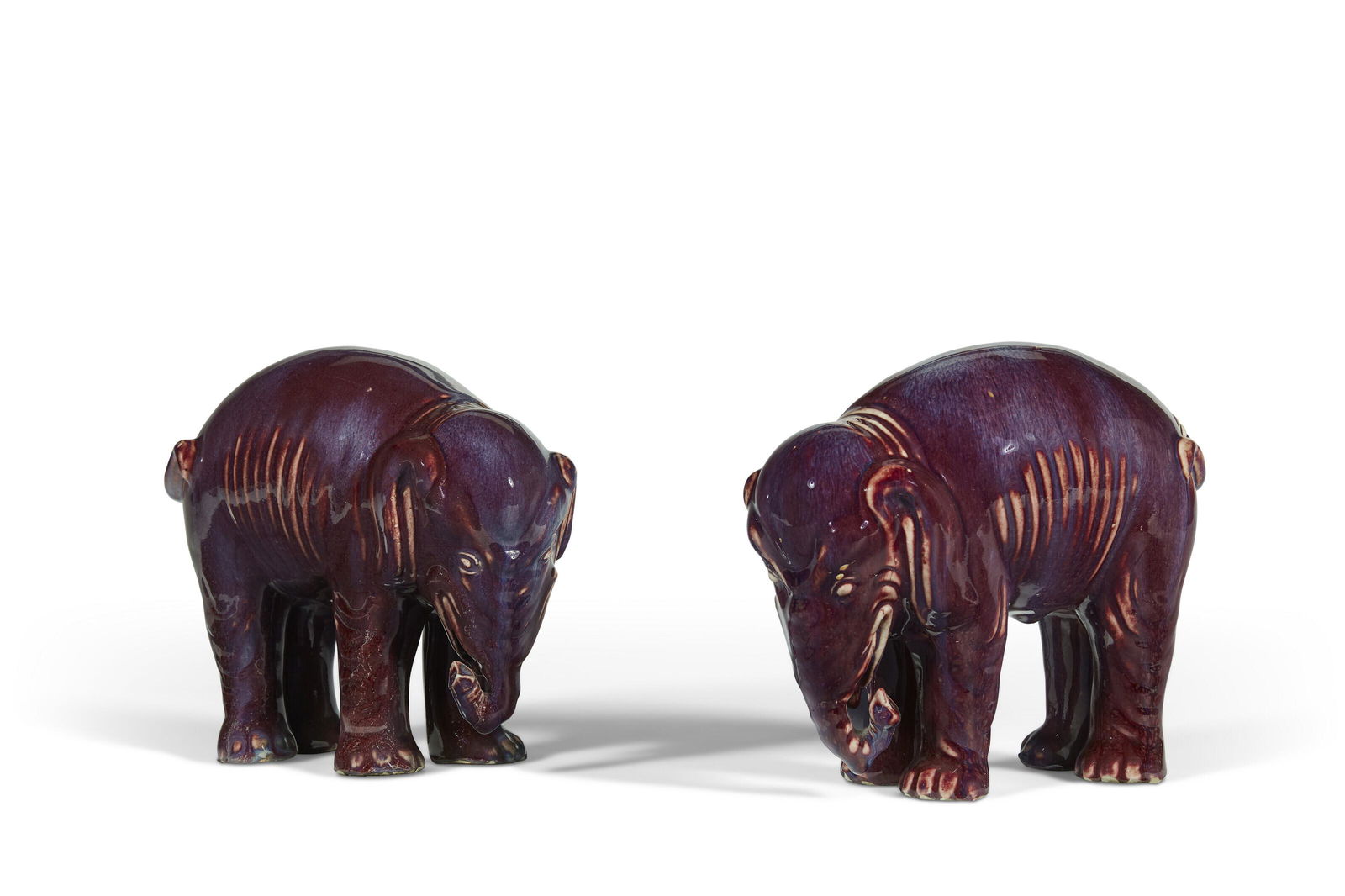 A PAIR OF CHINESE PORCELAIN FLAMBE-GLAZED ELEPHANTS - Oct 24, 2022 ...