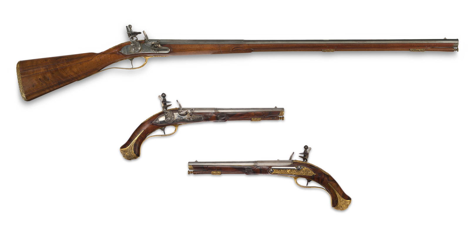 A Garniture Of Two Gilt-mounted Flintlock Belt Pistols And A Sporting ...