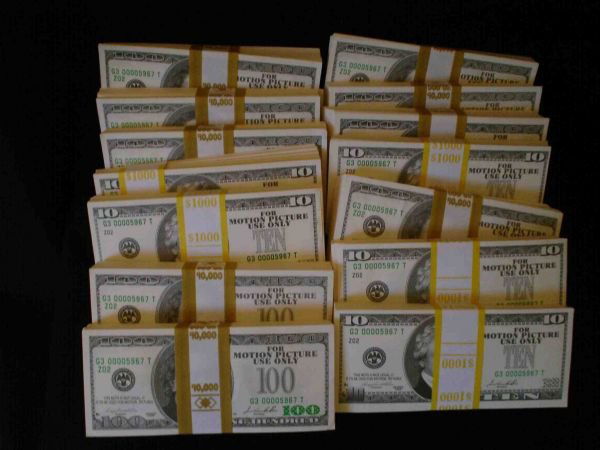 54: Prop Bank Notes. 14 wads of prop $100 and $10 bills