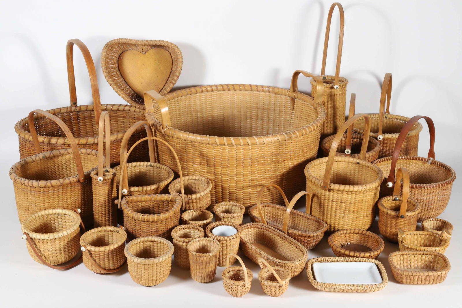 Collection Of Approximately Thirty-one Hand Made Nantucket Baskets In Various Forms And Makers ...
