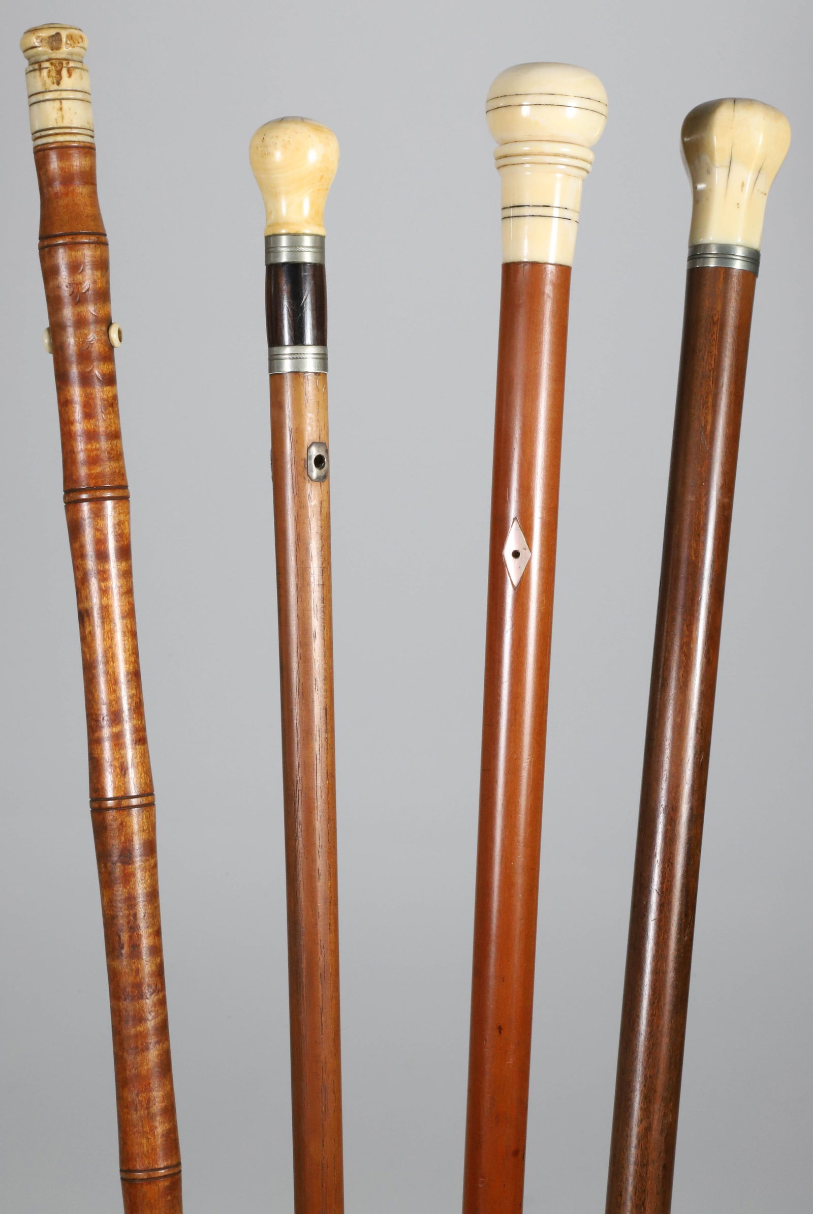 Collection Of Four Whaler Made Walking Sticks, Early To Late 19th ...