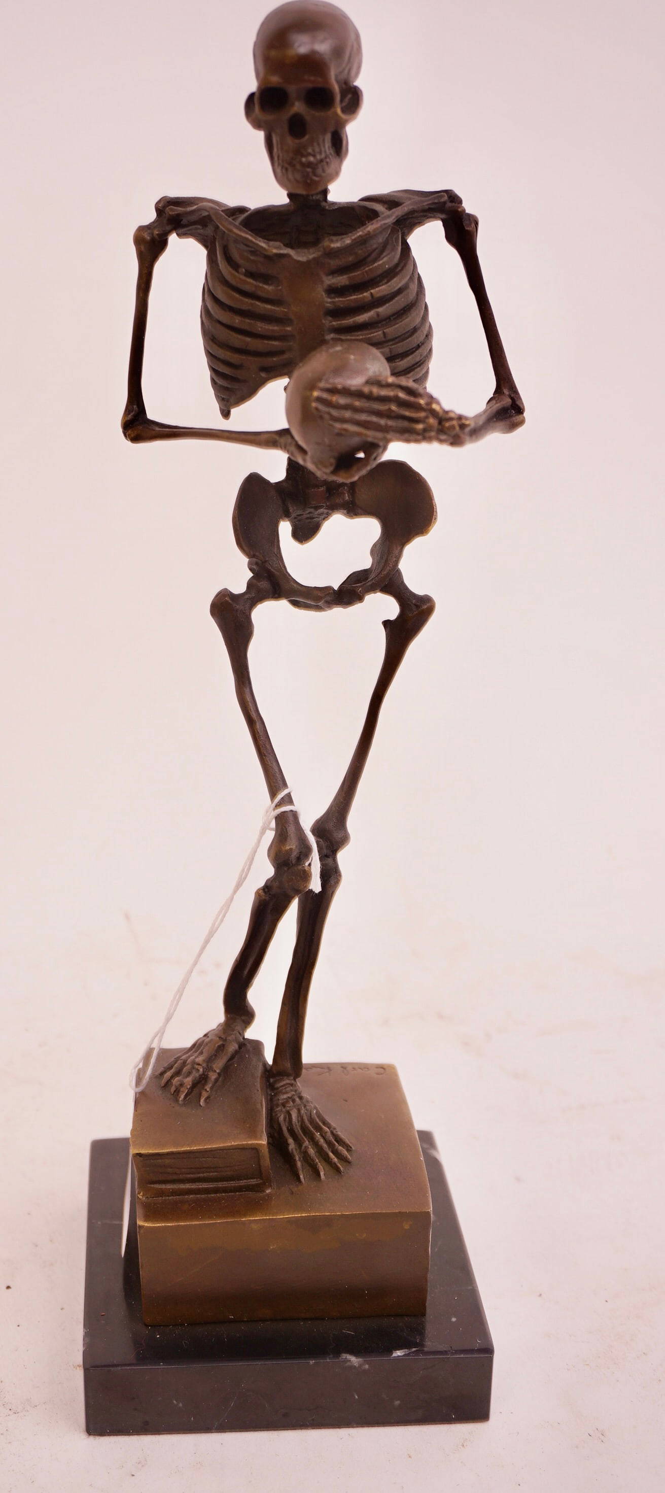 Bronze Statue Skeleton Holding A Skull Auction