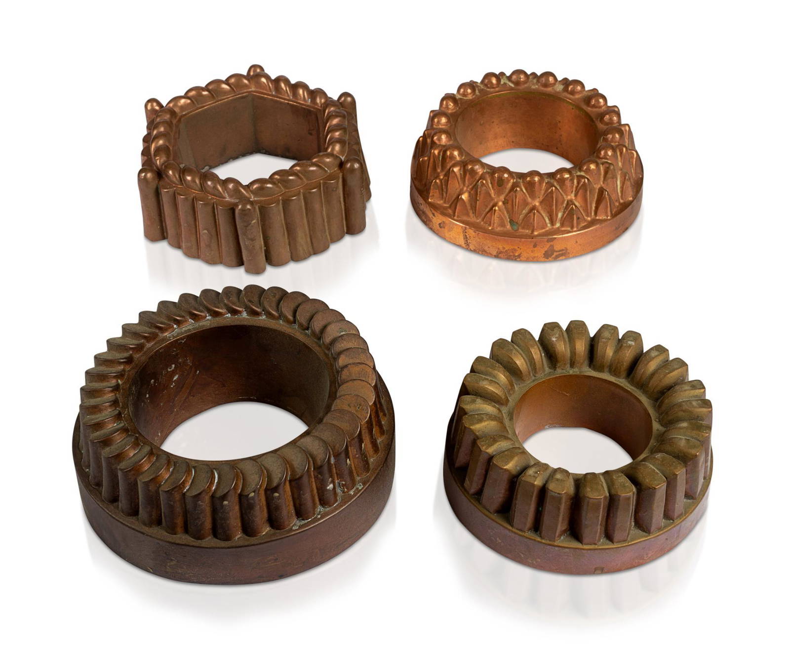 Four 19th Century Copper Food Molds. Auction