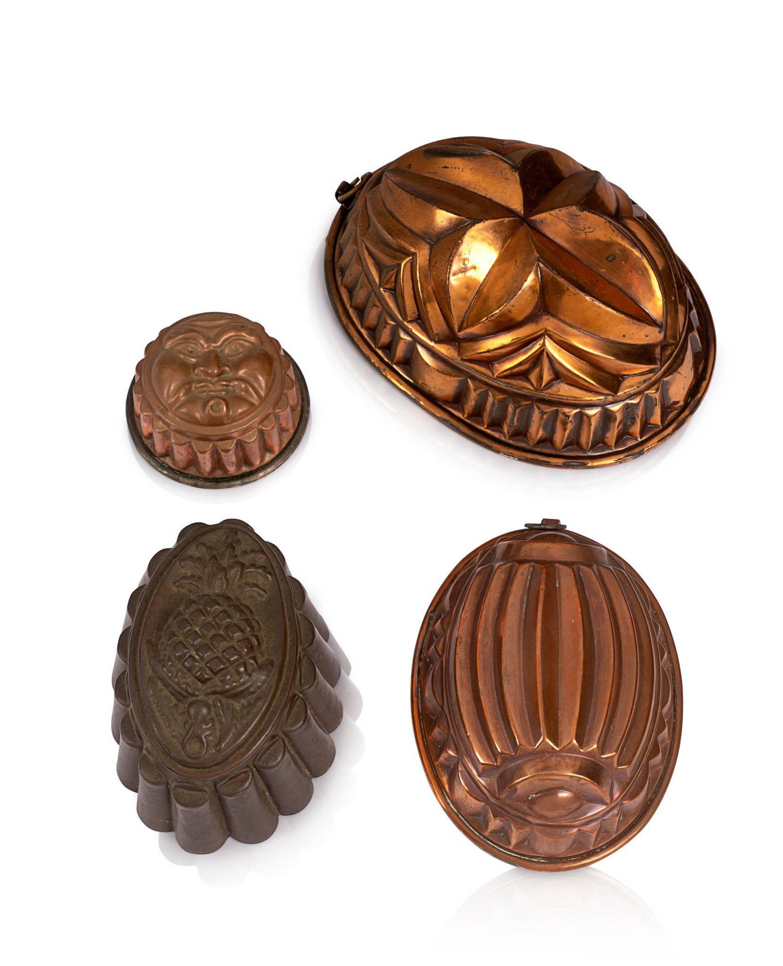Four 19th Century Copper Food Molds. Auction