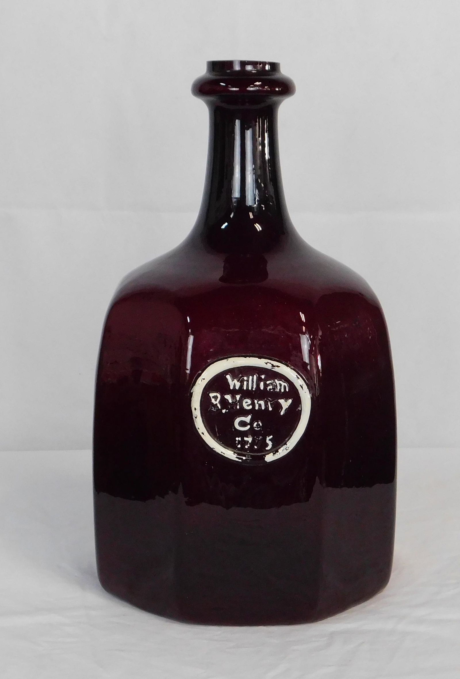 William B. Henry Co Large Ruby Red Bottle