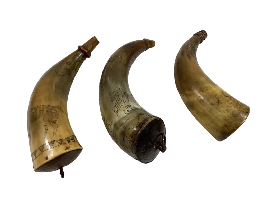 Three Carved Powder Horns Auction