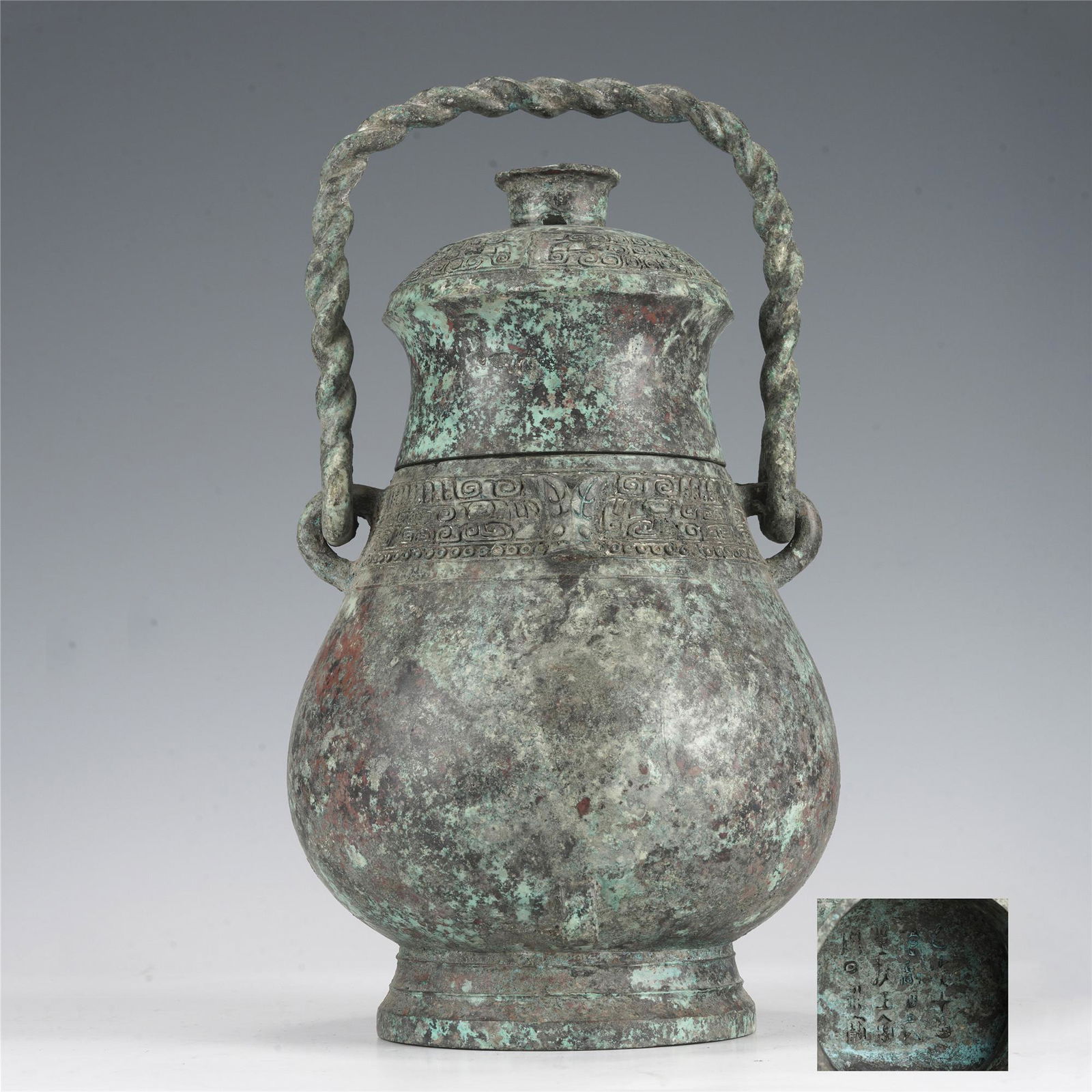 A Bronze Ritual Wine Vessel And Cover (you)