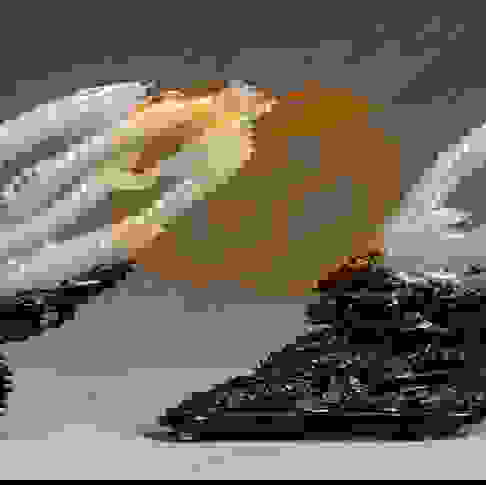 Two Chinese Carved Jade Conjoined Rings Auction