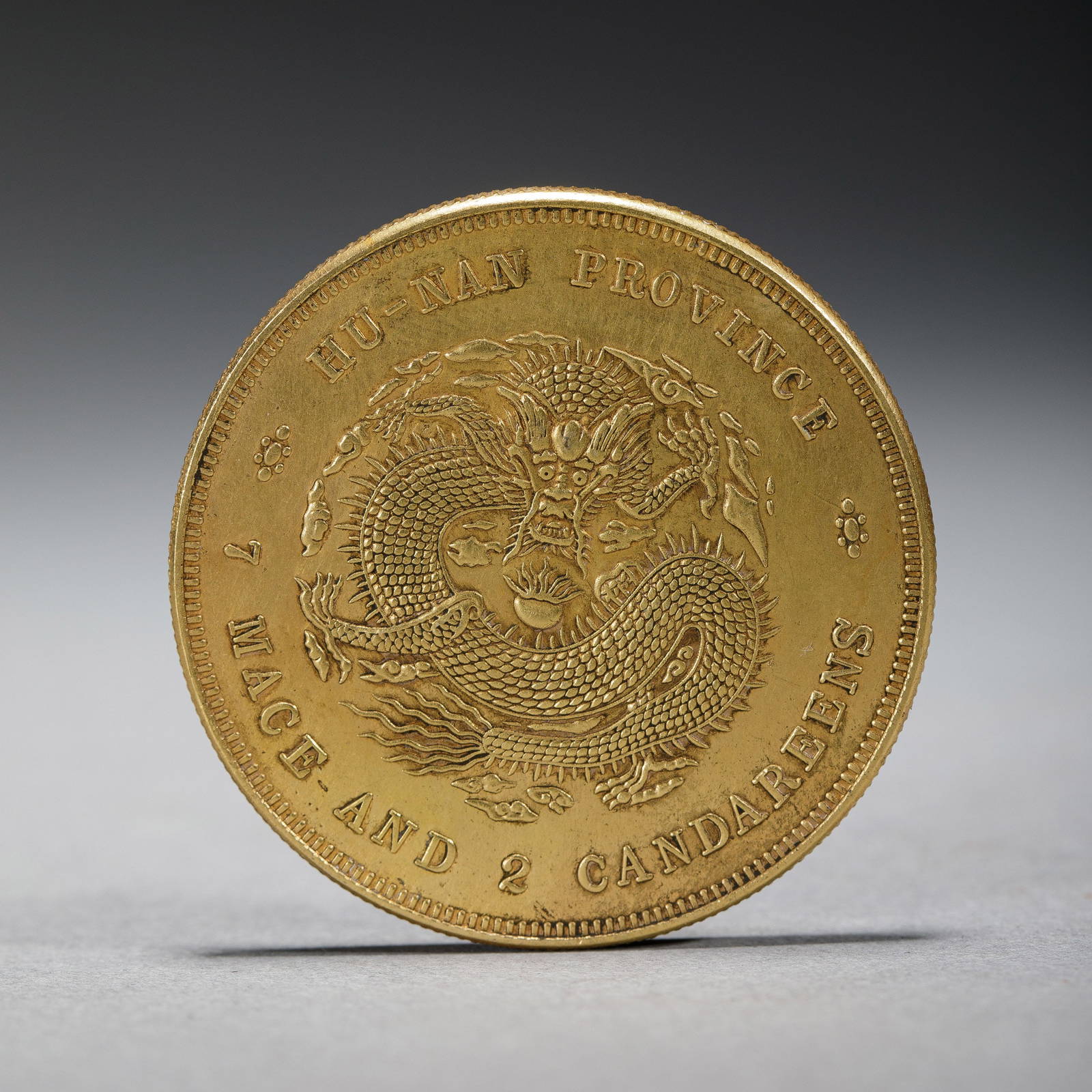 A Bronze-gilt Dragon Coin Auction
