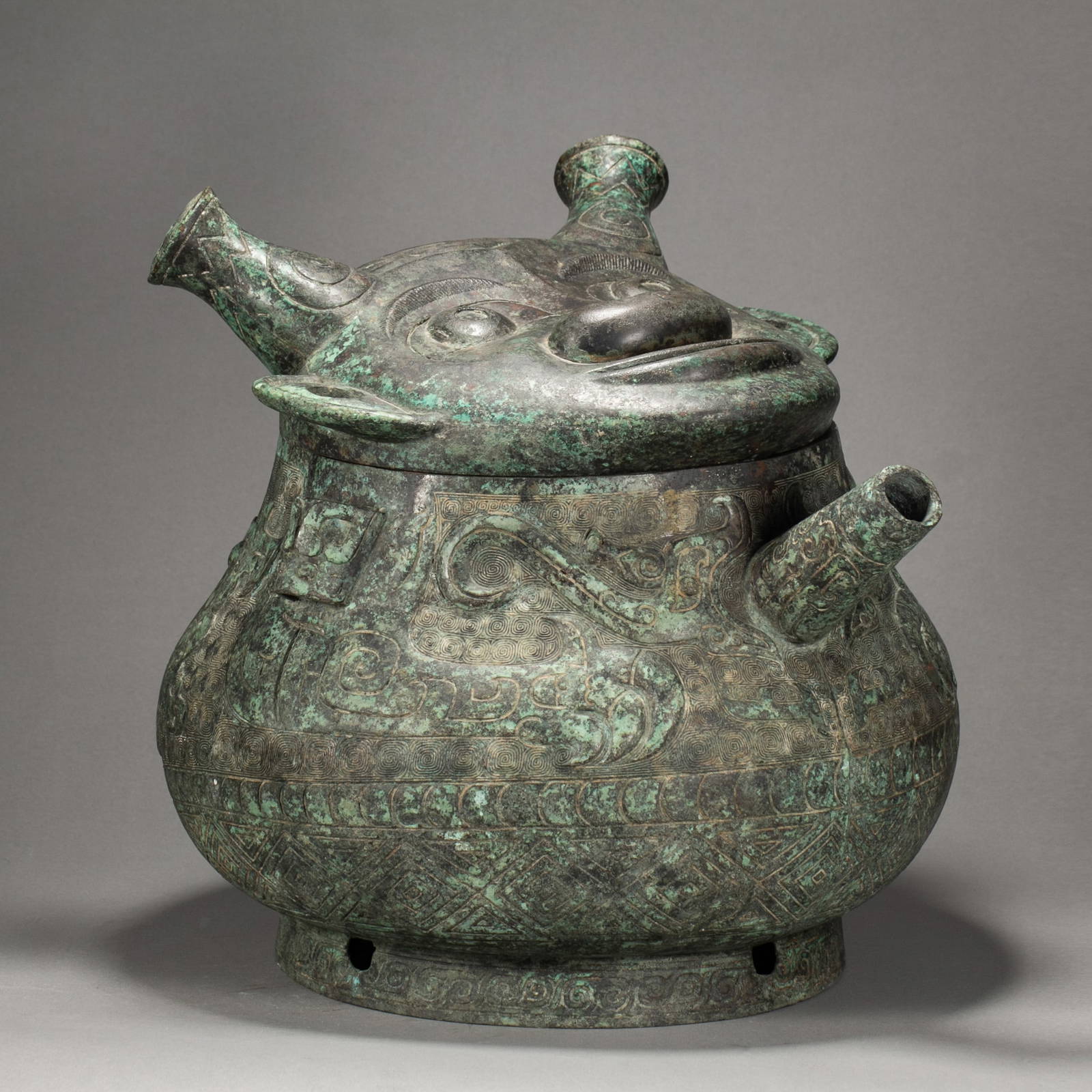 A Chinese Extremely Rare Bronze Mythical Face Vessel Auction