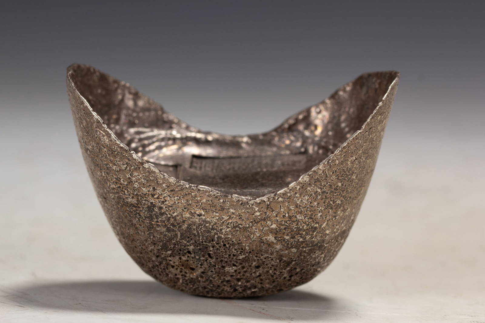 A Chinese Silver Ingot Auction