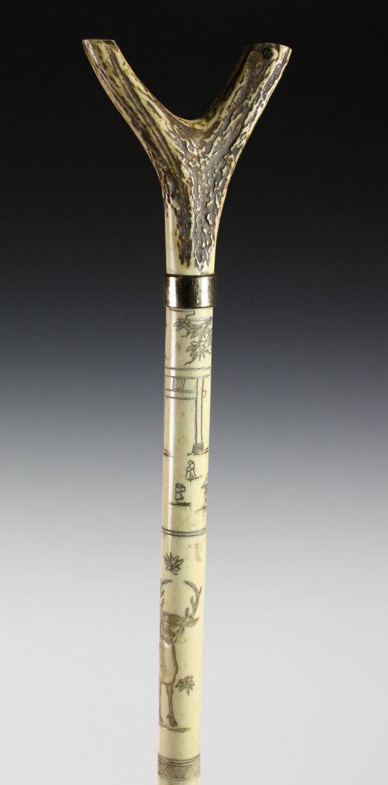 40: A 19th Century Carved Staff. The forked antler hand