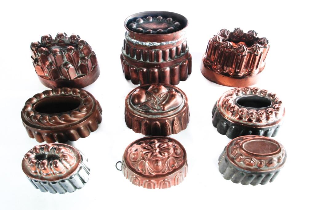 Nine Copper Food Molds.