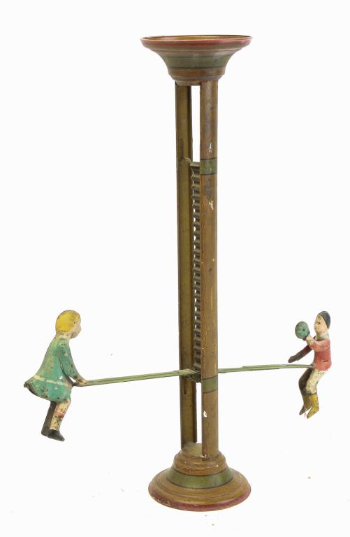 Painted Tin Gravity Driven Teeter Totter Toy