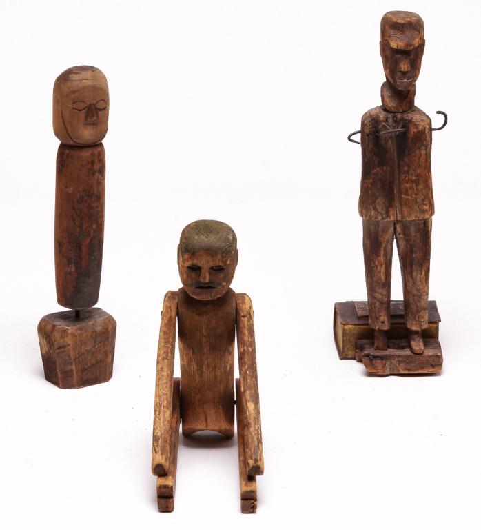 Three American Folk Art Carvings Of Men.