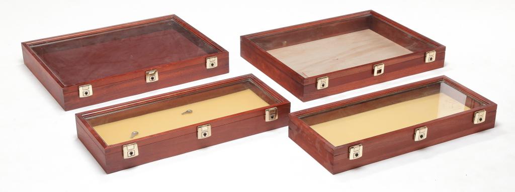 Four Table Top Display Cases.