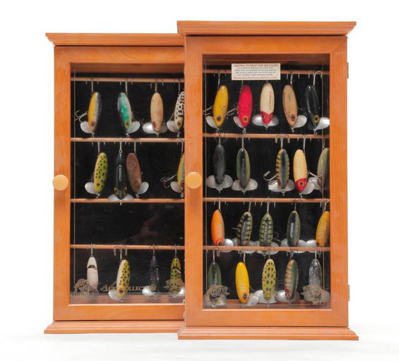 Grouping Of "jitterbug" Lures In Display Cases.