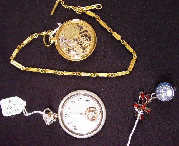 Three Open Face Watches. A Pocket Watch