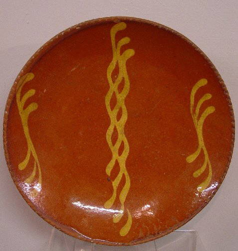 Redware Pie Plate. Coggled Rim And Three
