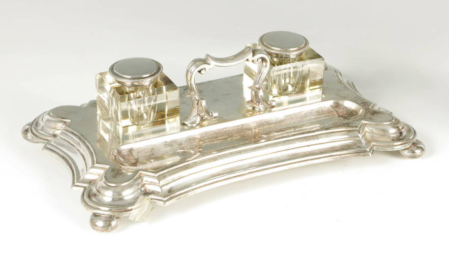 AN EDWARDIAN SILVER INKSTAND the shaped tray raised on (#0279) on Oct ...