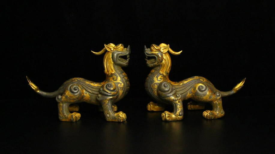 A Pair Of Partial Gilt Beasts From The Han Dynasty