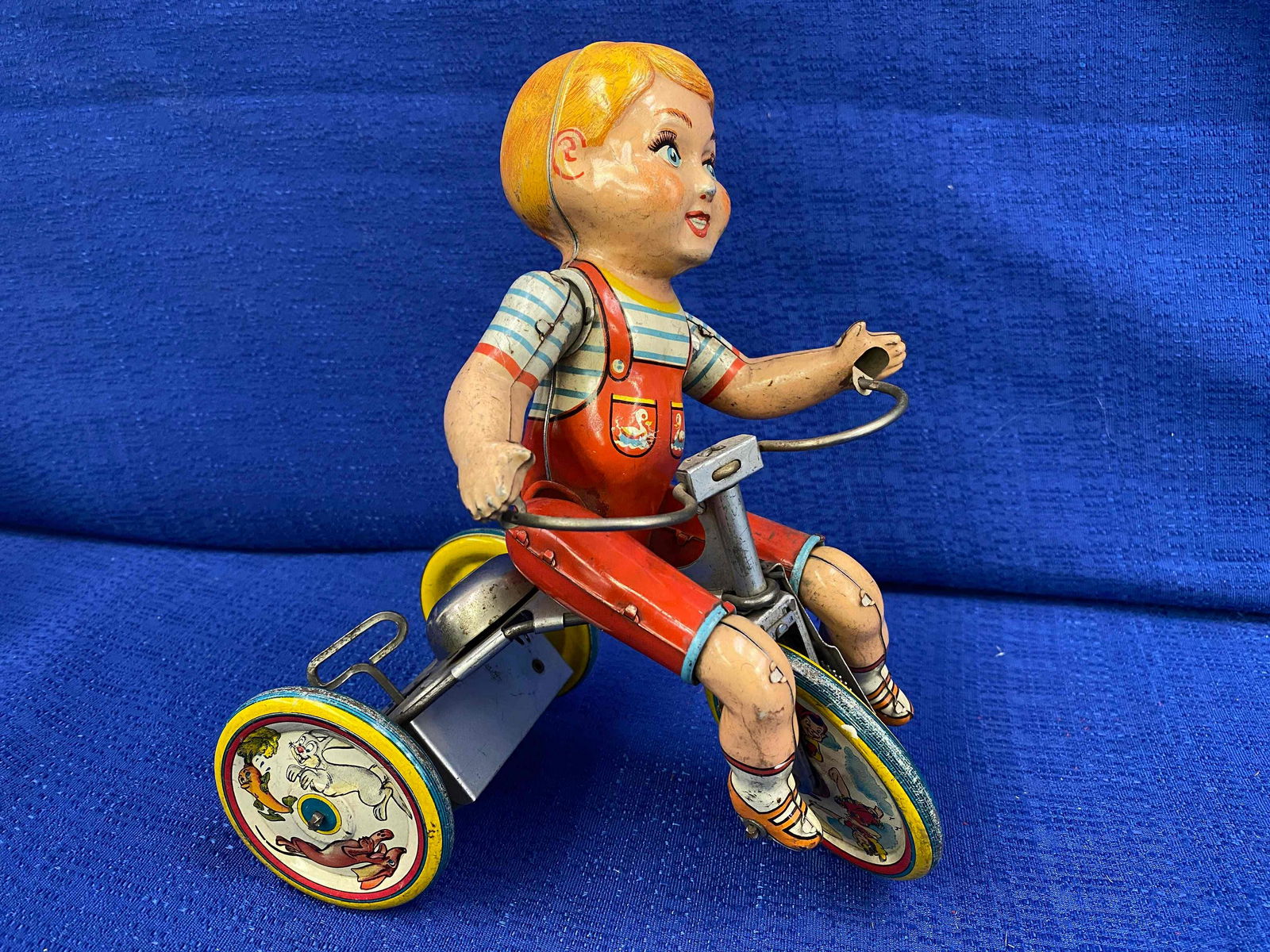 Vintage Kiddy Cyclist Tin Toy